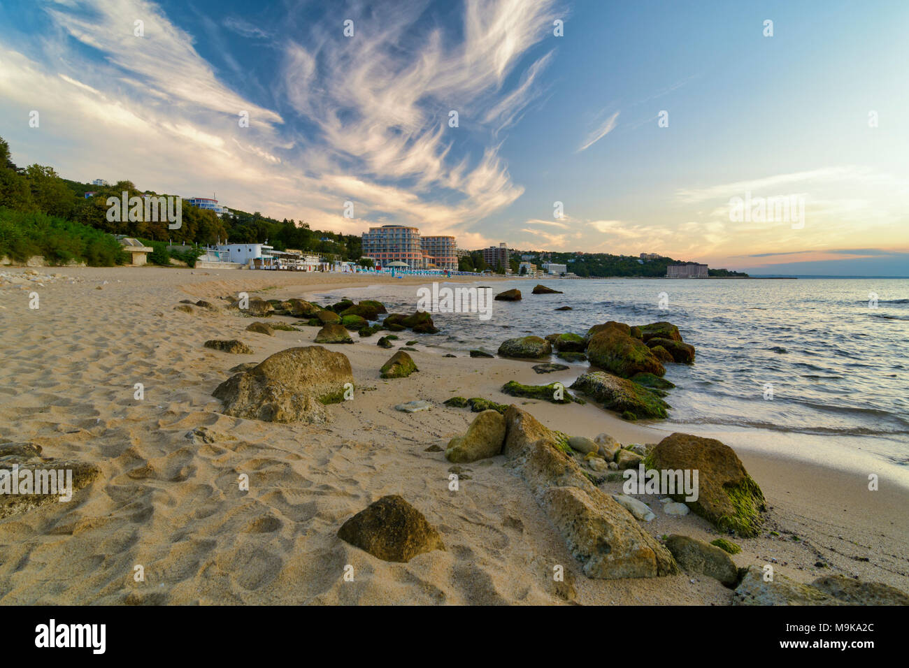 panoramic view of the Beach and blue sky , hotel in the background ...
