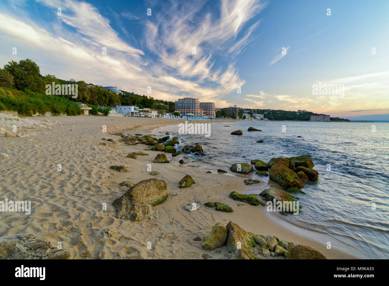panoramic view of the Beach and blue sky , hotel in the background ...