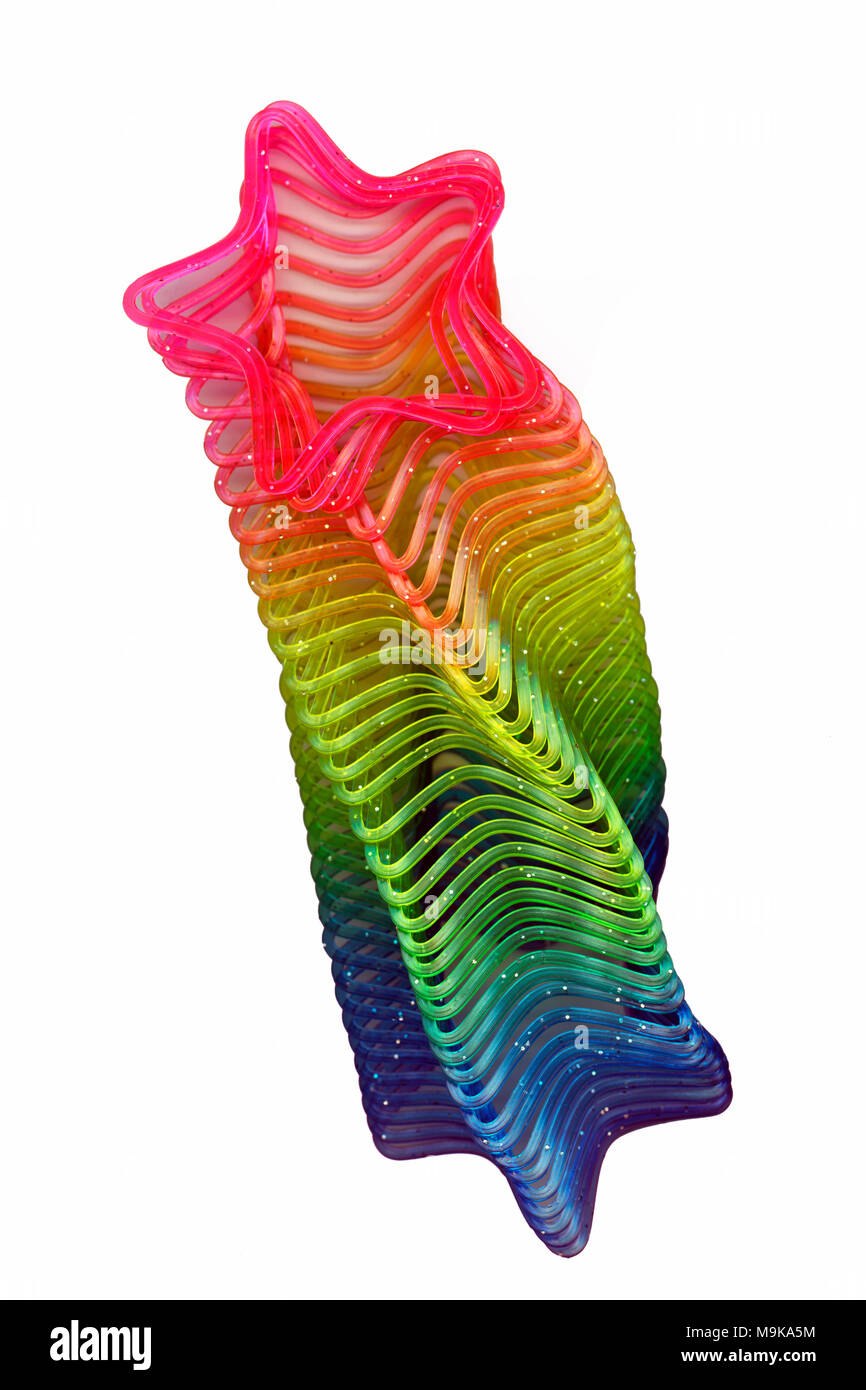 A photograph of a rainbow color star shape plastic object Stock Photo ...