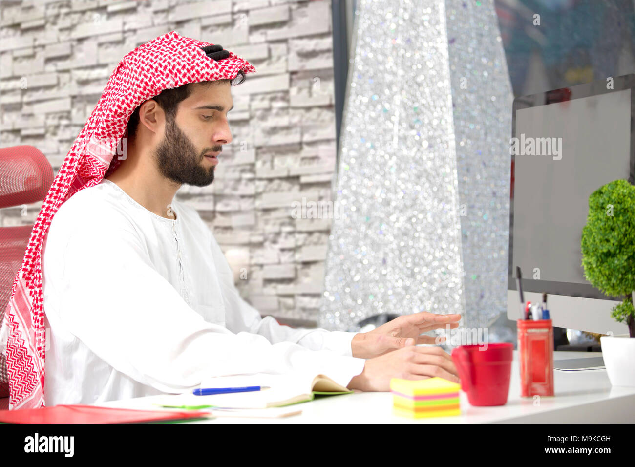 Arabian business man working on Laptop in the office Stock Photo - Alamy