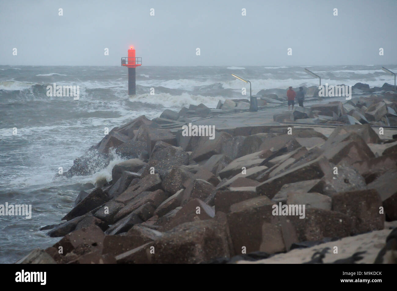 Entrance to the fishing harbour and North Sea in Thorsminde, Central ...