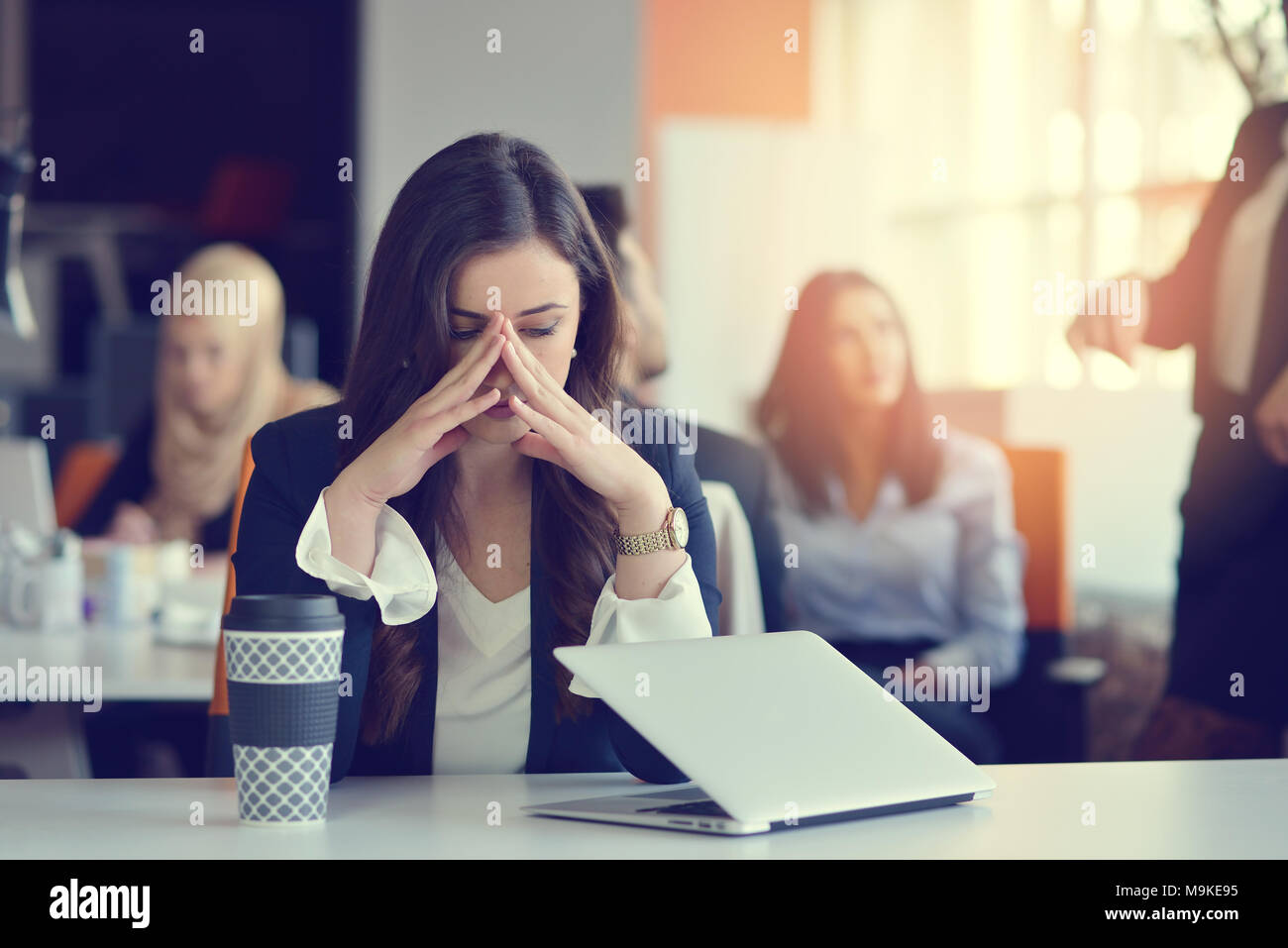 Young busy beautiful latin business woman suffering stress working at ...