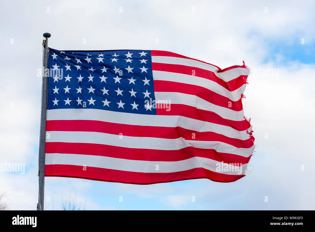 American flag flutters in wind hi-res stock photography and images - Alamy