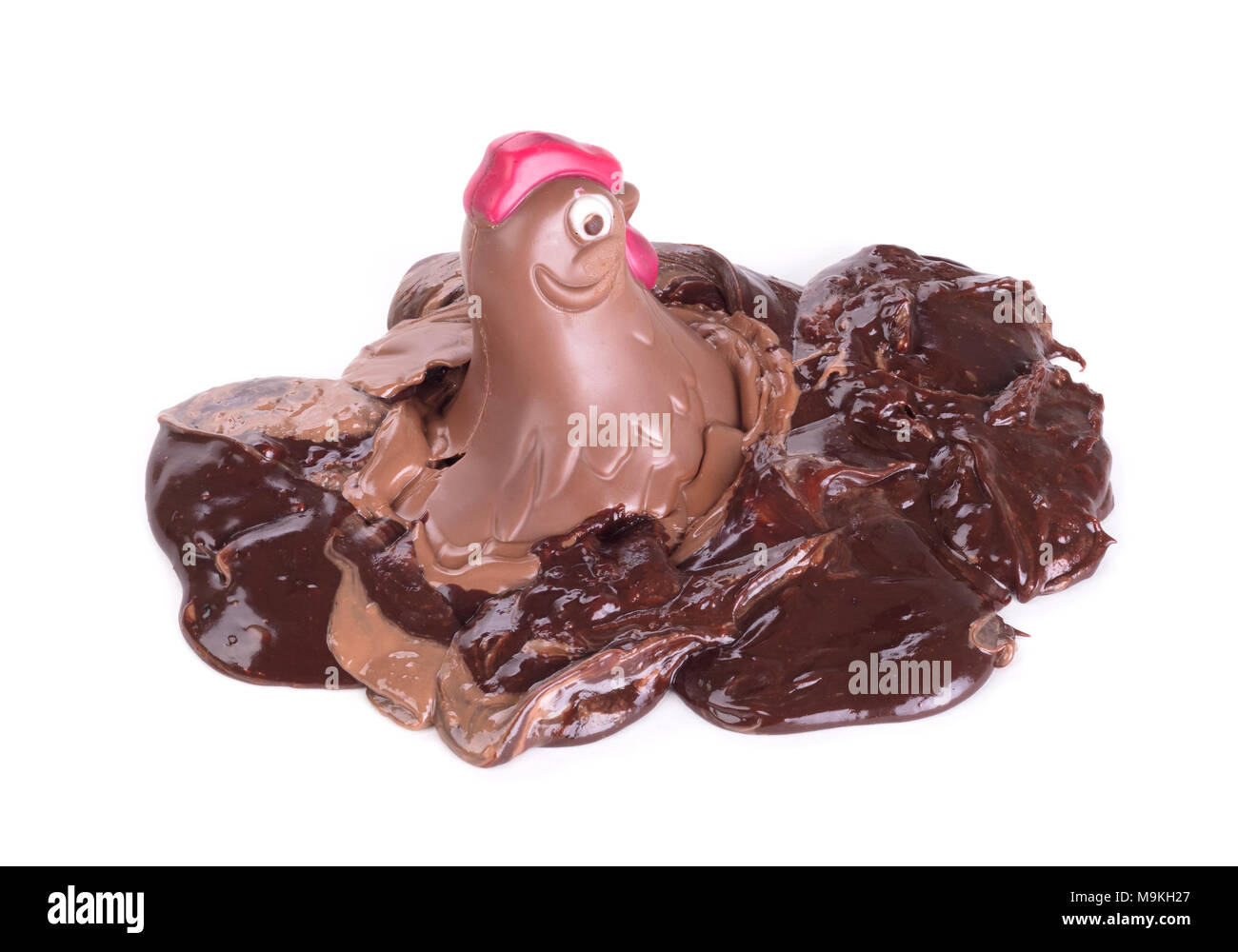 Melting chocolate easter chicken - Isolated on white background Stock ...