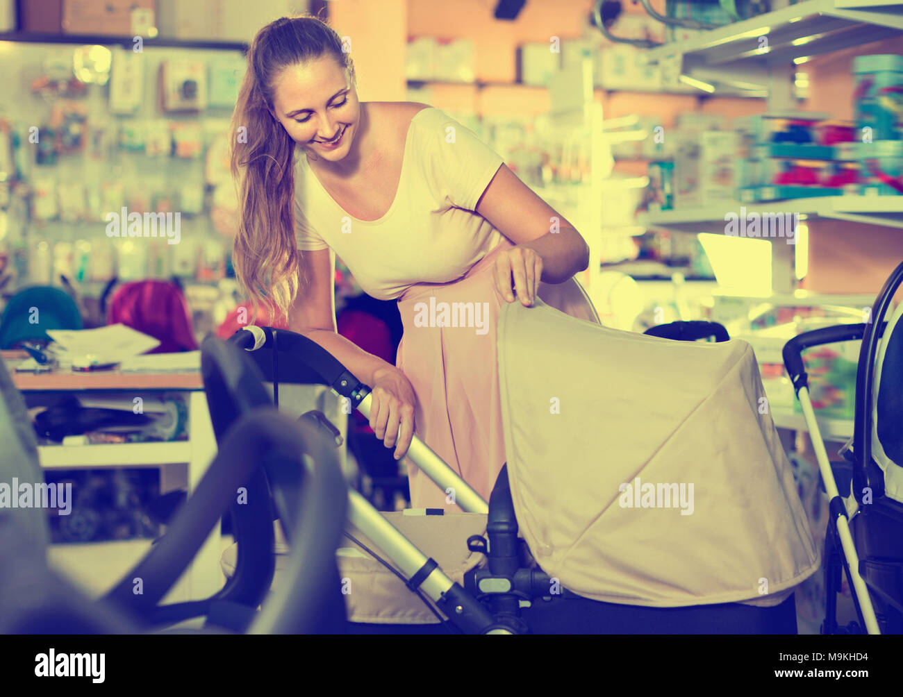 Young pregnant woman pram in hi-res stock photography and images - Alamy