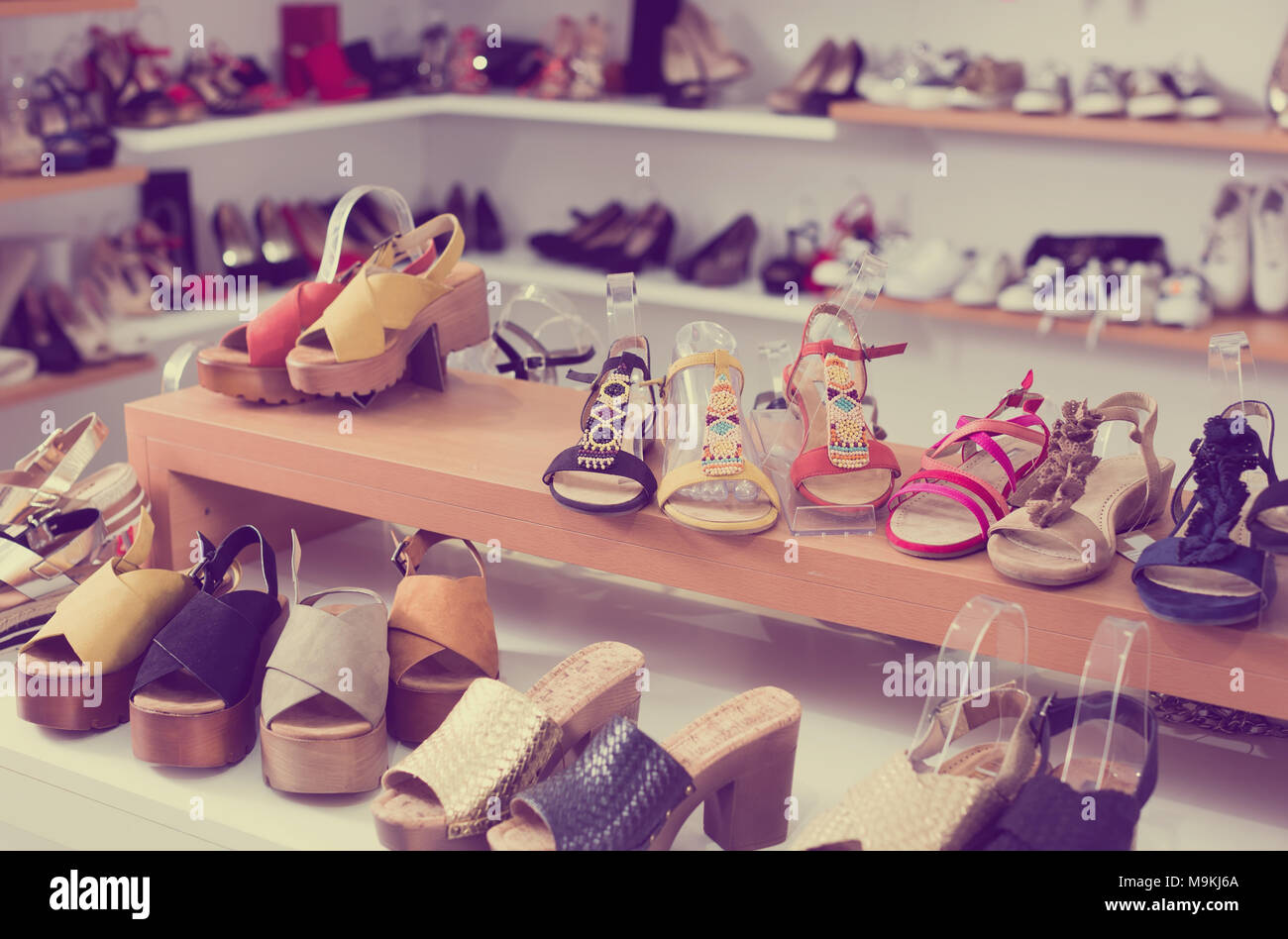 image of shelves with sandals in the shoes shop Stock Photo - Alamy
