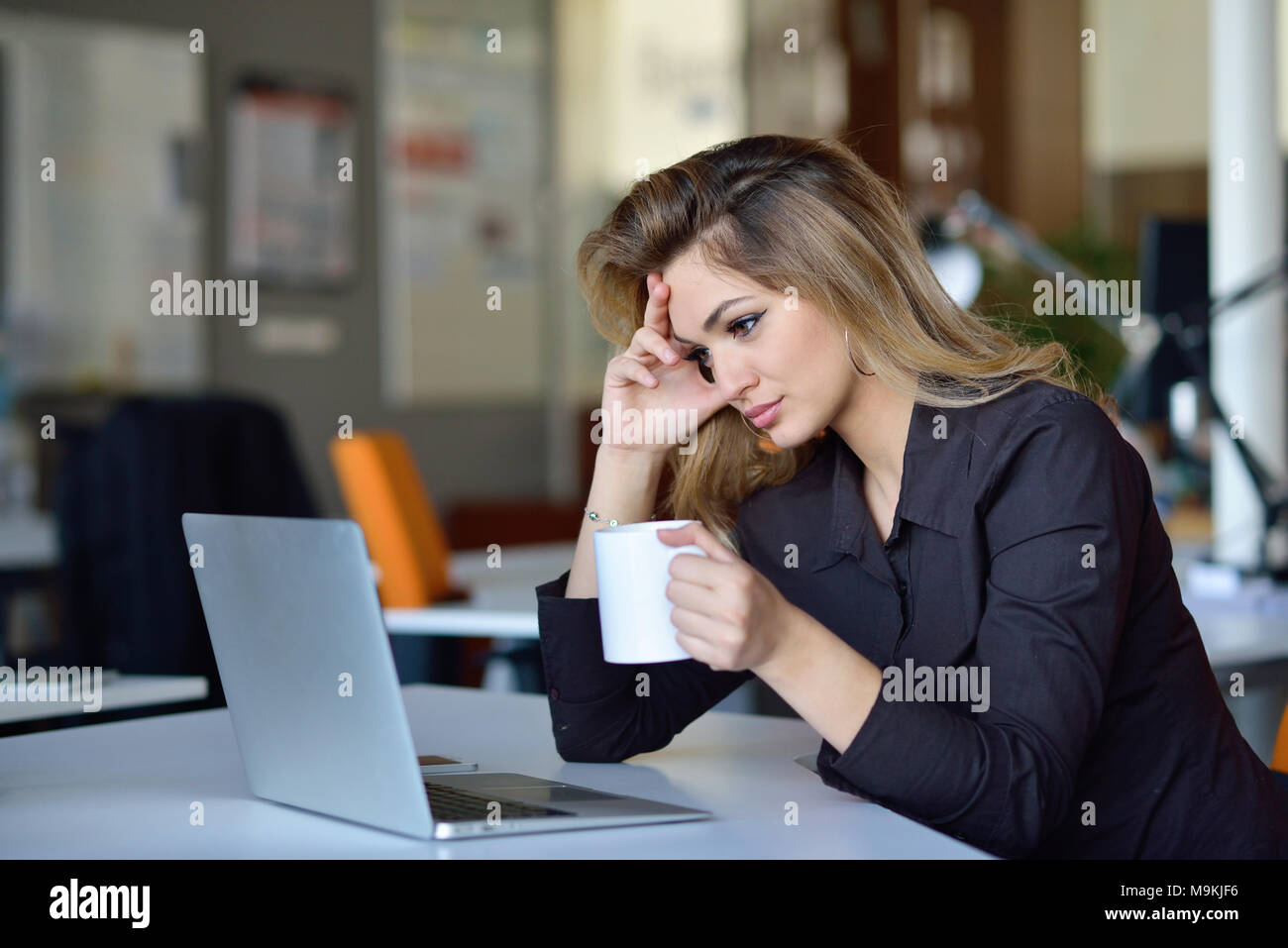 Young busy beautiful latin business woman suffering stress working at ...