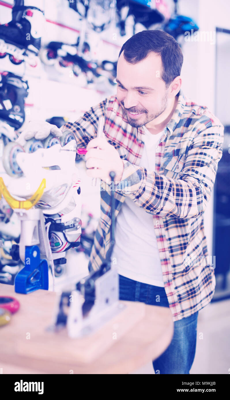 Cheerful male master fixing hi-res stock photography and images - Alamy
