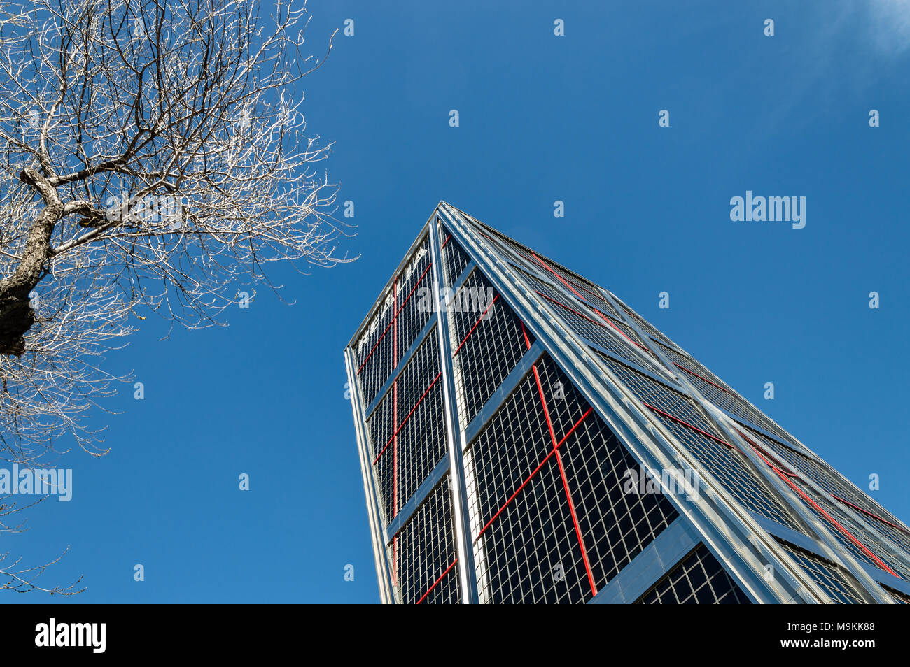 Madrid, Spain - March 26, 2018: Low angle view of KIO Tower office ...