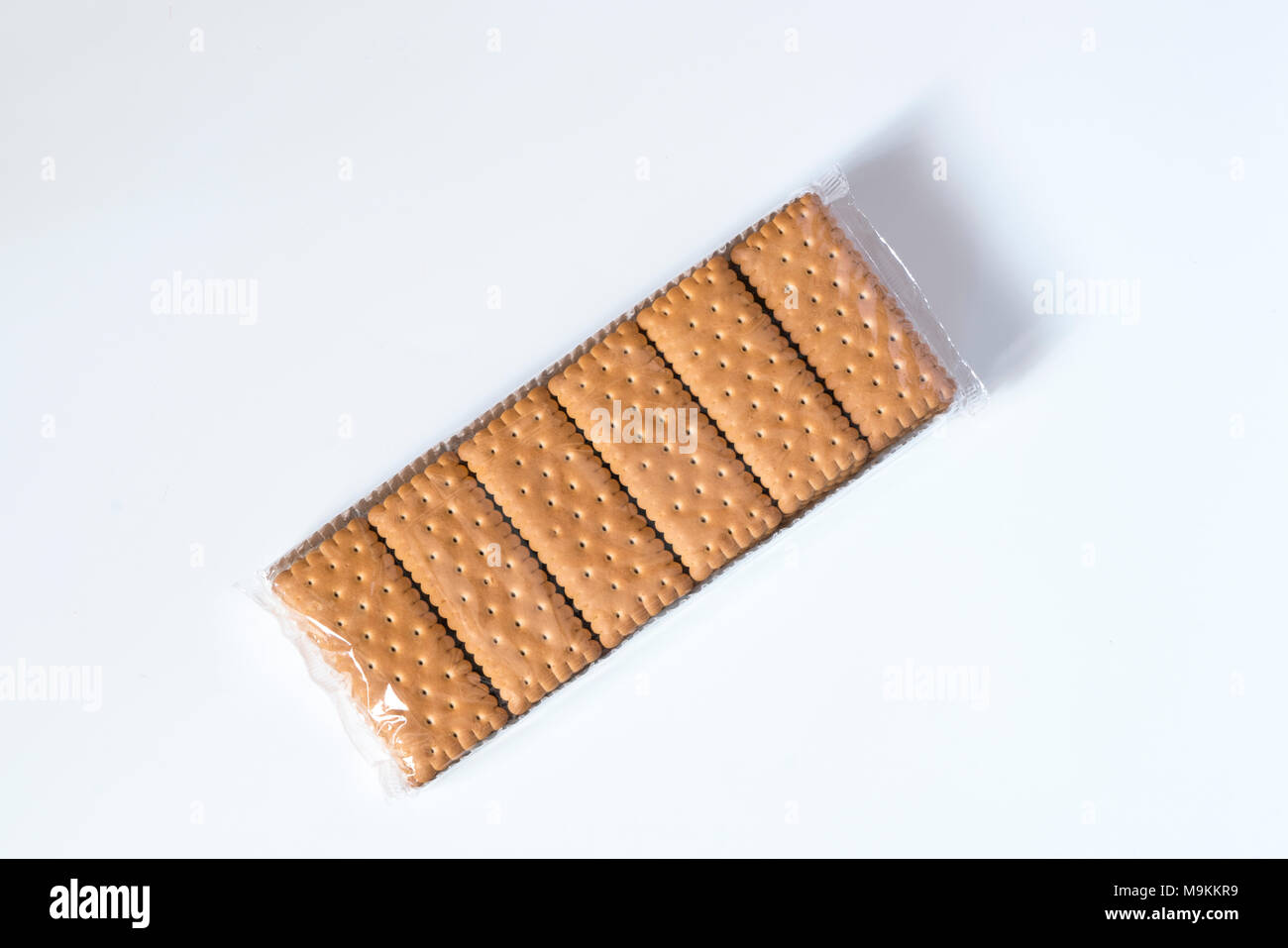 a pack of cookies on a white surface Stock Photo - Alamy