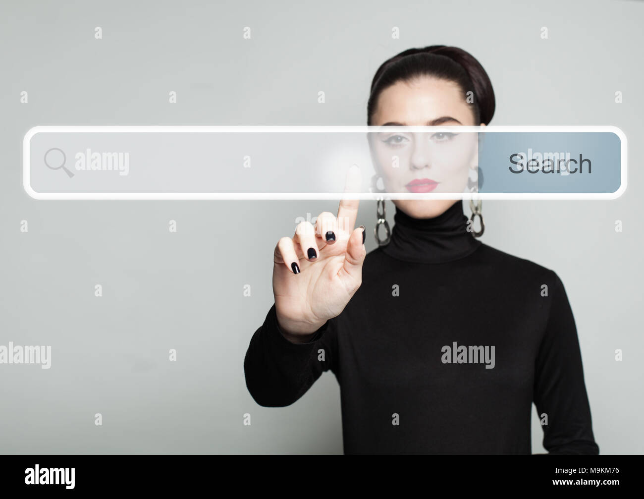 New technology and internet surfing concept. Pointing female hand and ...