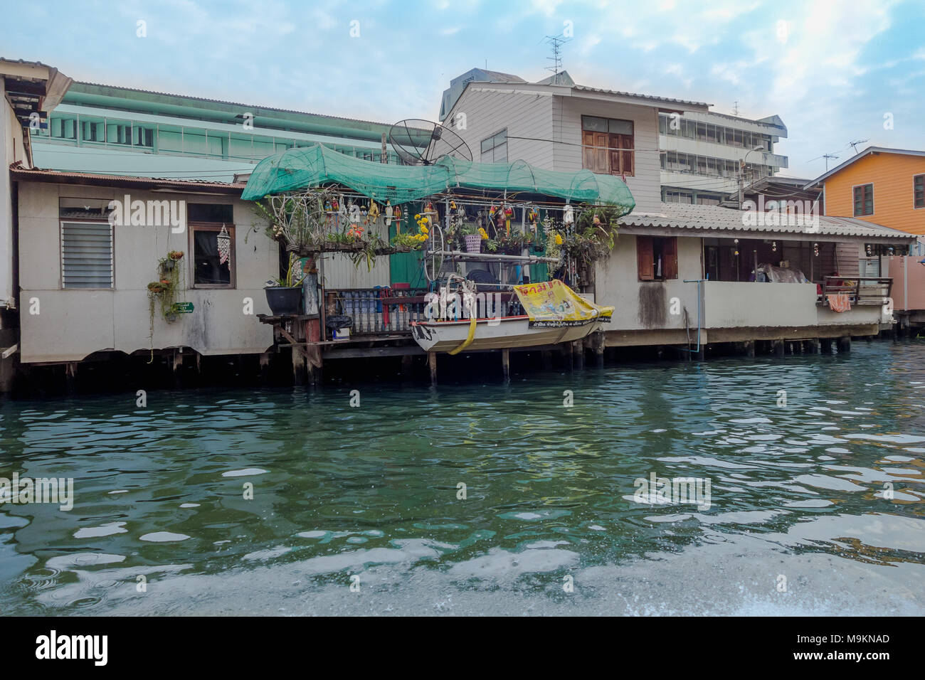 BANGKOK, THAILAND, MARCH, 23, 2018: Outdoor view of floating poor house ...