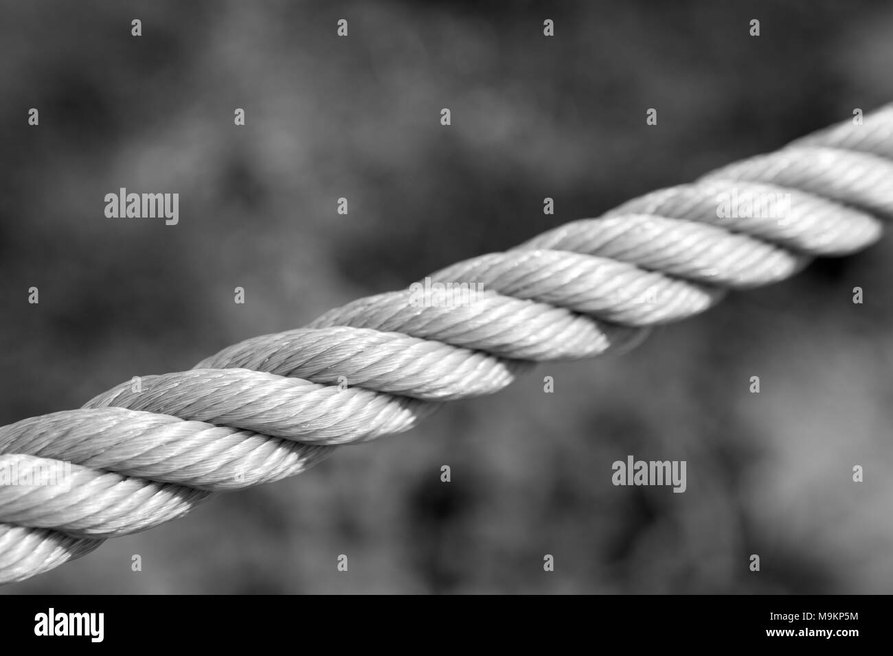A white rope B&W Stock Photo - Alamy