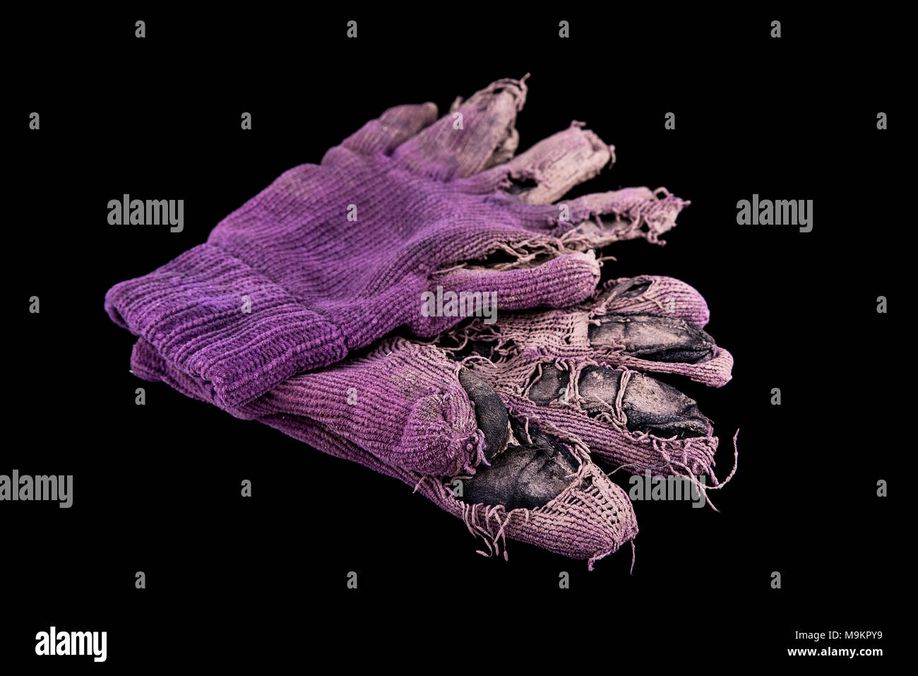 Torn gloves hi-res stock photography and images - Alamy