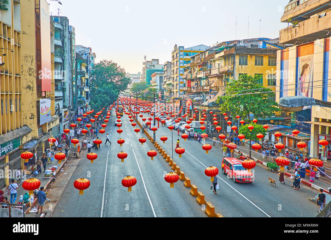 YANGON, MYANMAR - FEBRUARY 14, 2018: The Maha Bandula road in Chinatown ...