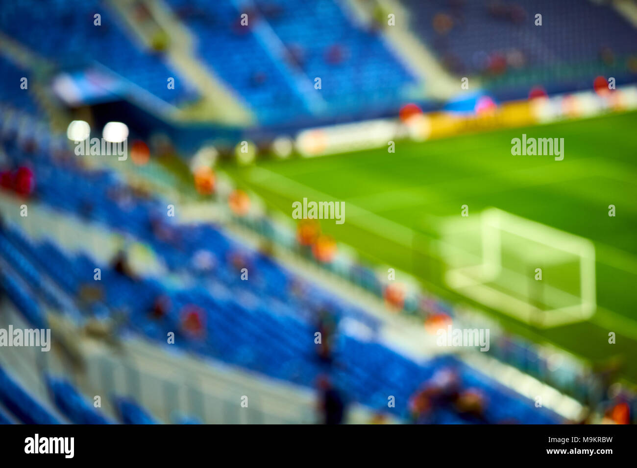 Empty blue green football soccer field stadium. Soft focus blurred ...