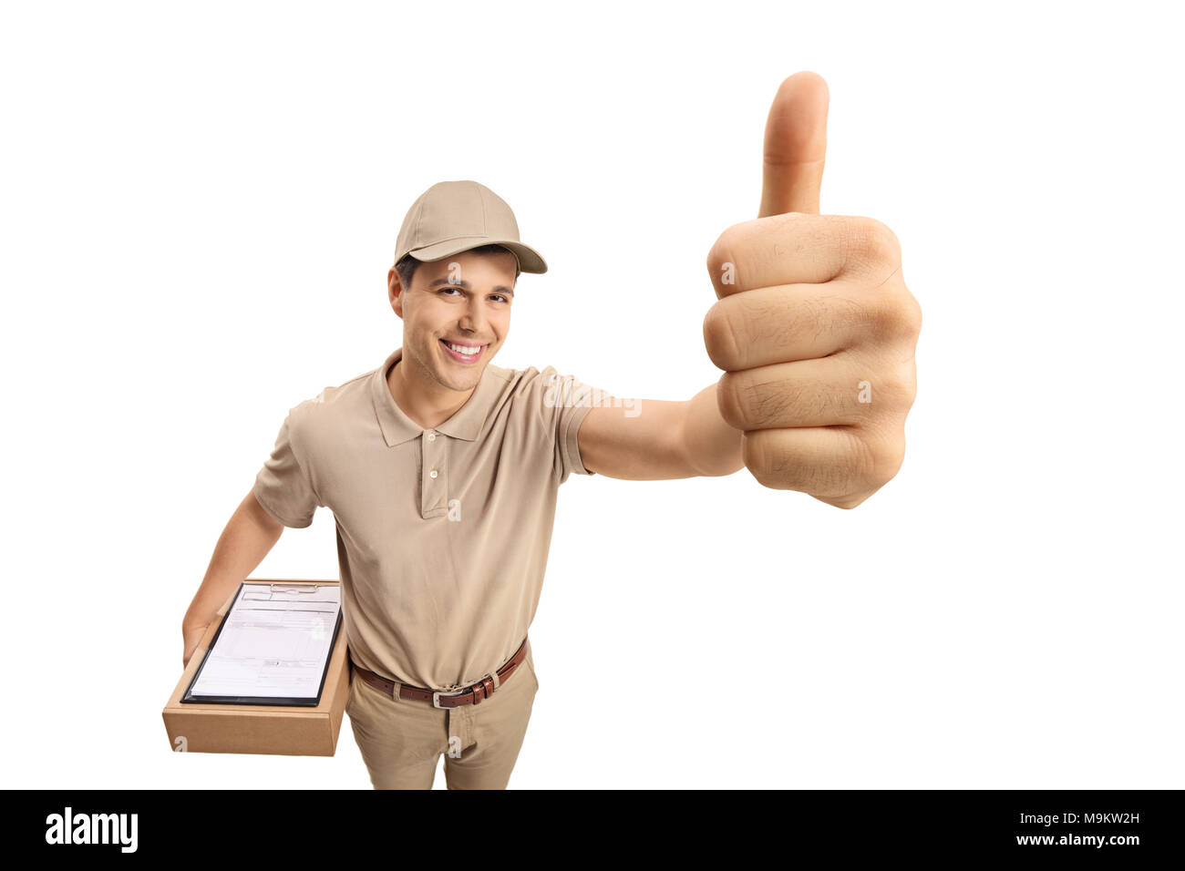 Delivery man making a thumb up gesture isolated on white background ...
