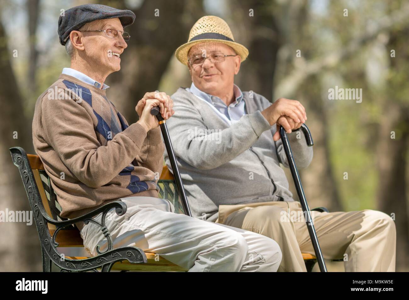 Two old people talking to each other hi-res stock photography and ...