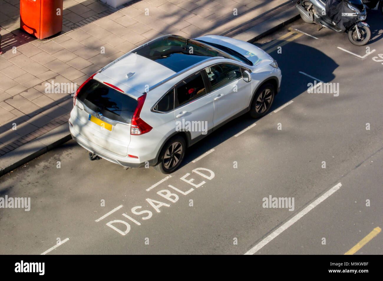 car disabled parking bay Stock Photo - Alamy