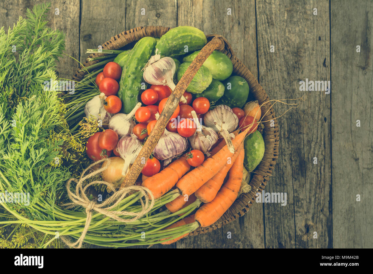 Collection of vegetables in the basket, local farming produce, toned ...