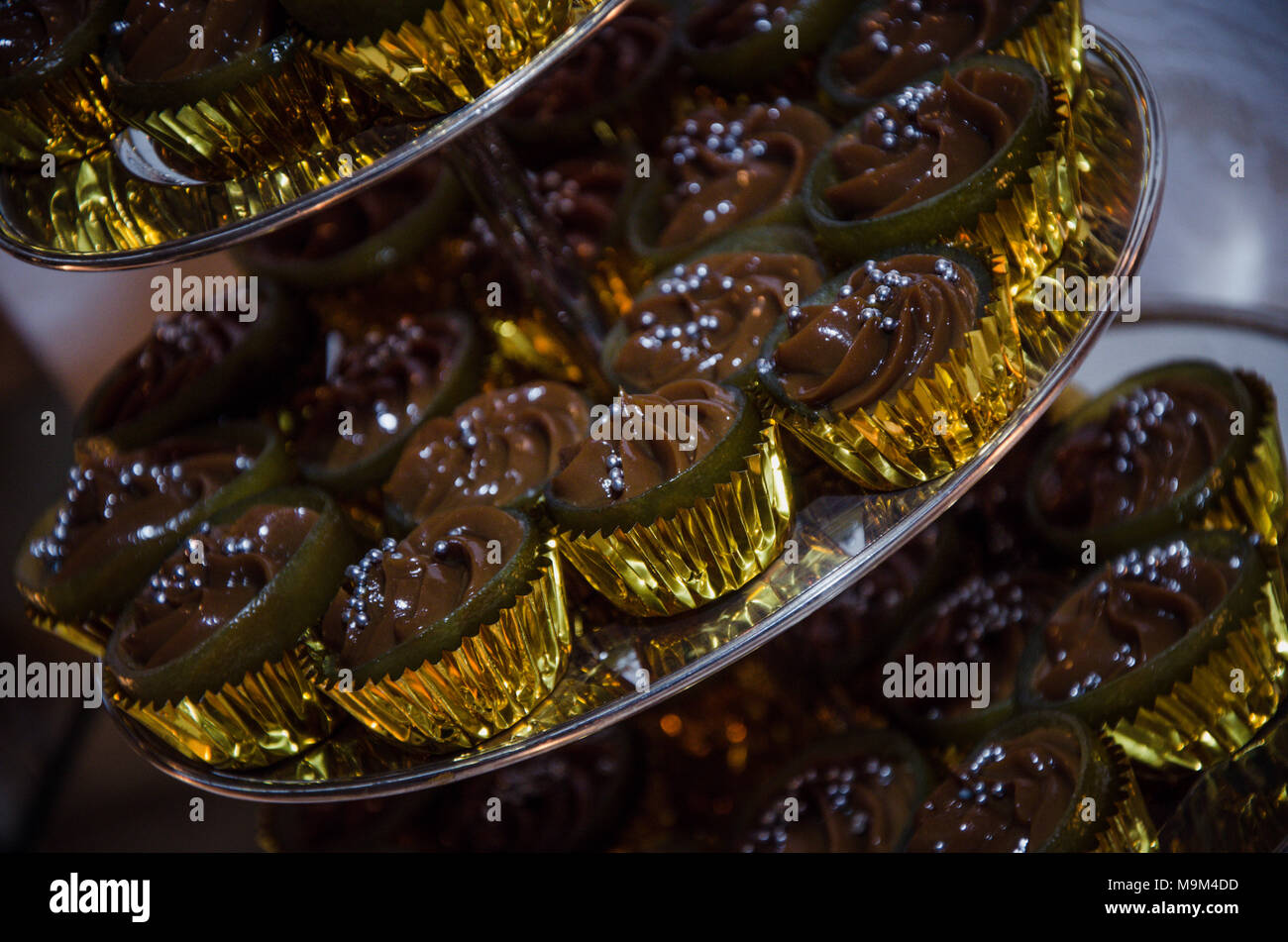 Mini chocolate cupcakes with silver candy balls Stock Photo - Alamy