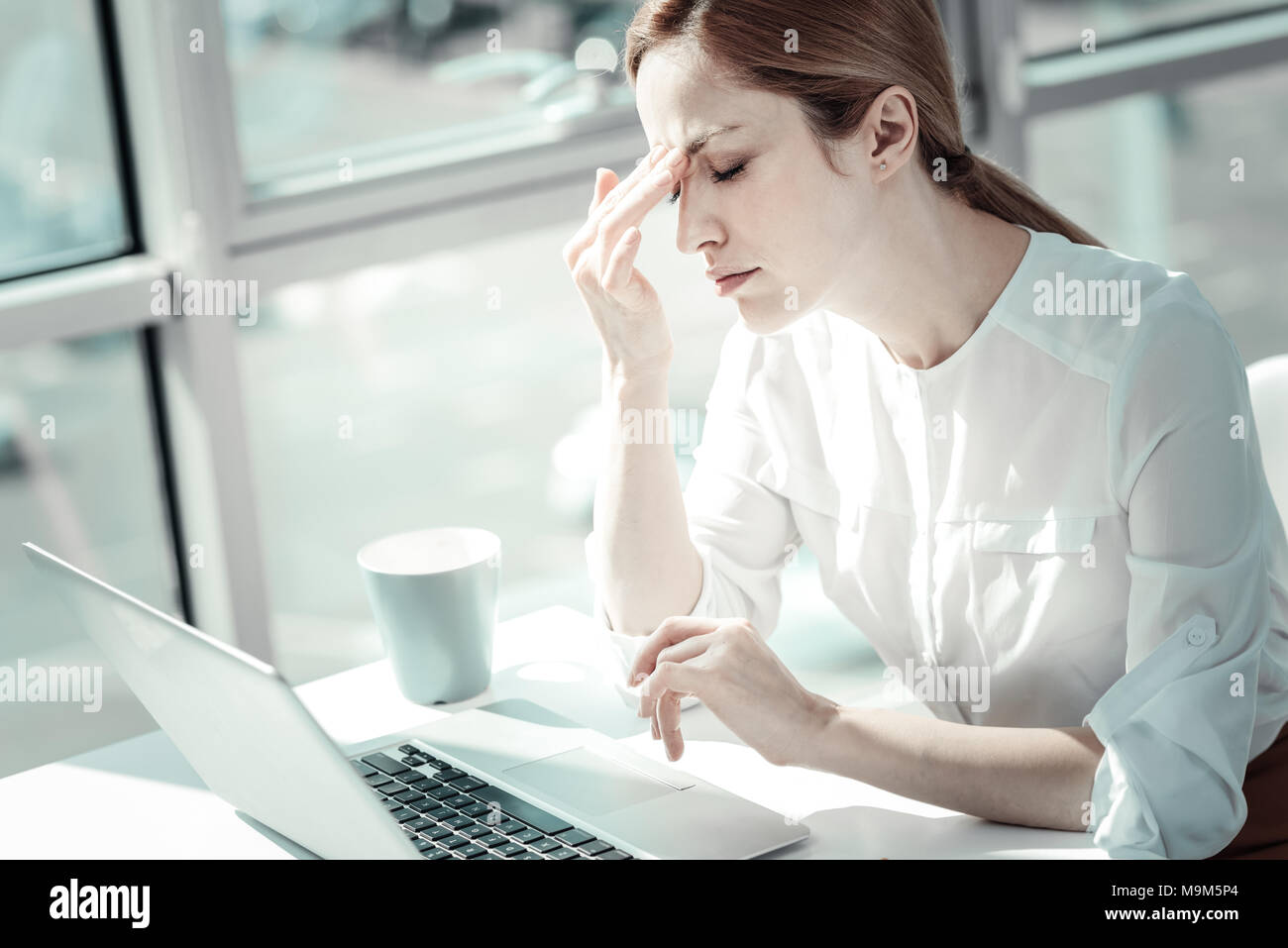 Close up businesswoman having headache hi-res stock photography and ...
