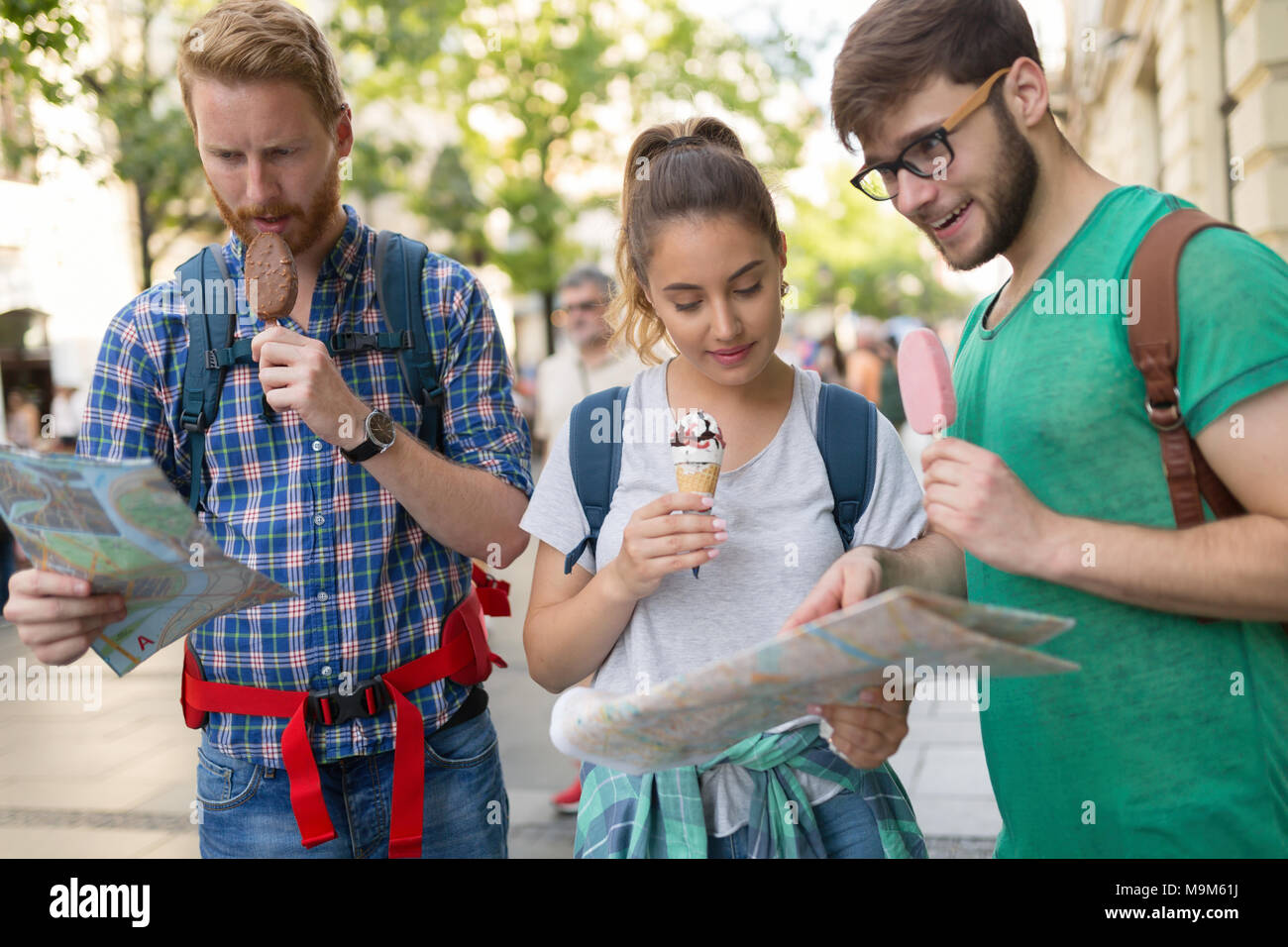 Travelling young people sightseeing Stock Photo - Alamy