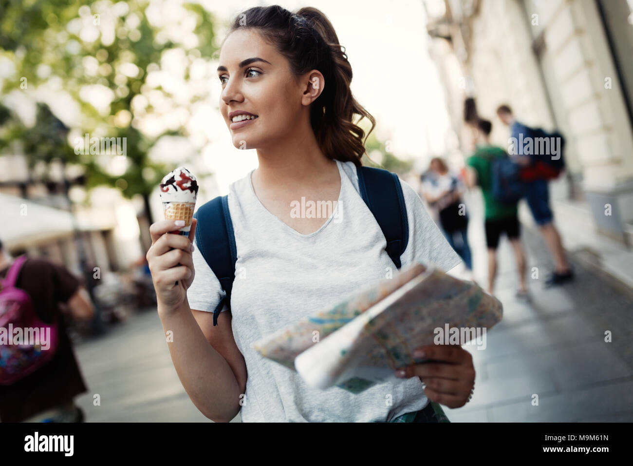 Beautiful woman eating ice cream hi-res stock photography and images ...
