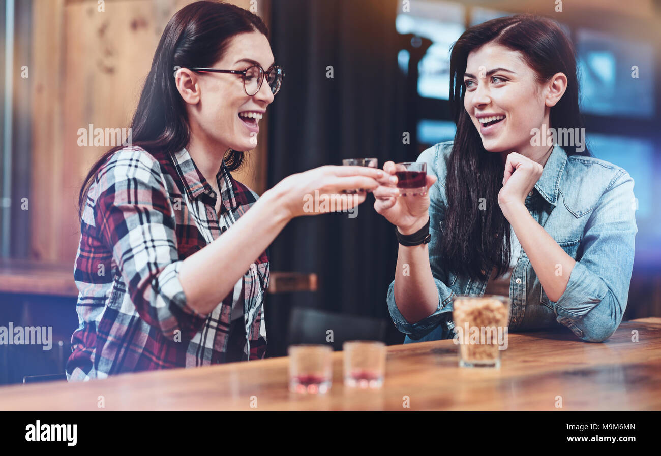 Woman drinking alcohol bar shots hi-res stock photography and images ...