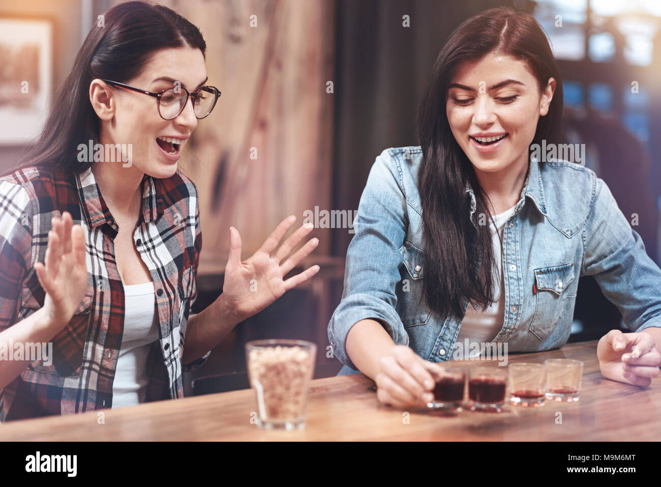 Woman drinking alcohol bar shots hi-res stock photography and images ...