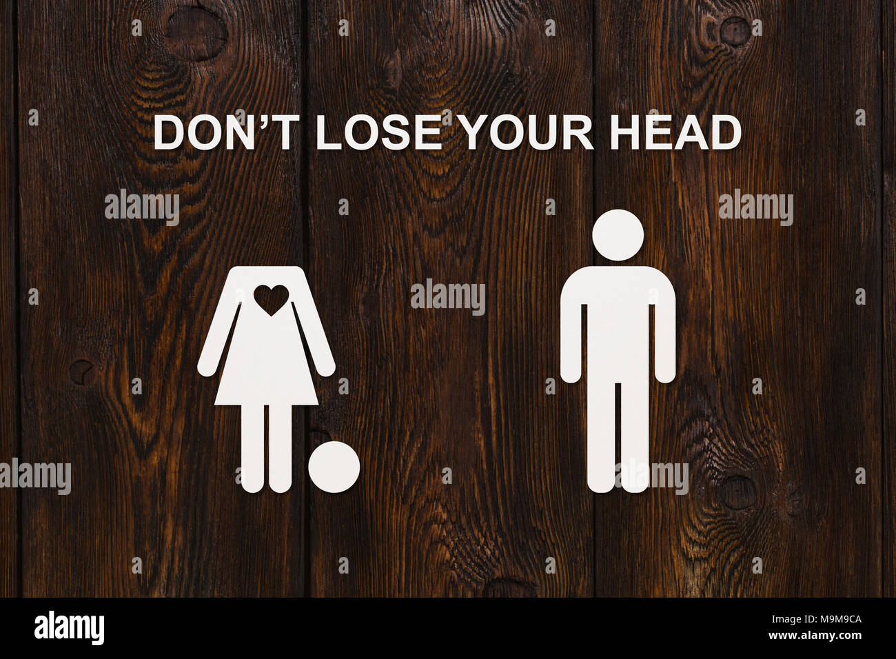 Paper woman without head and man with text DON'T LOSE YOUR HEAD. Love ...