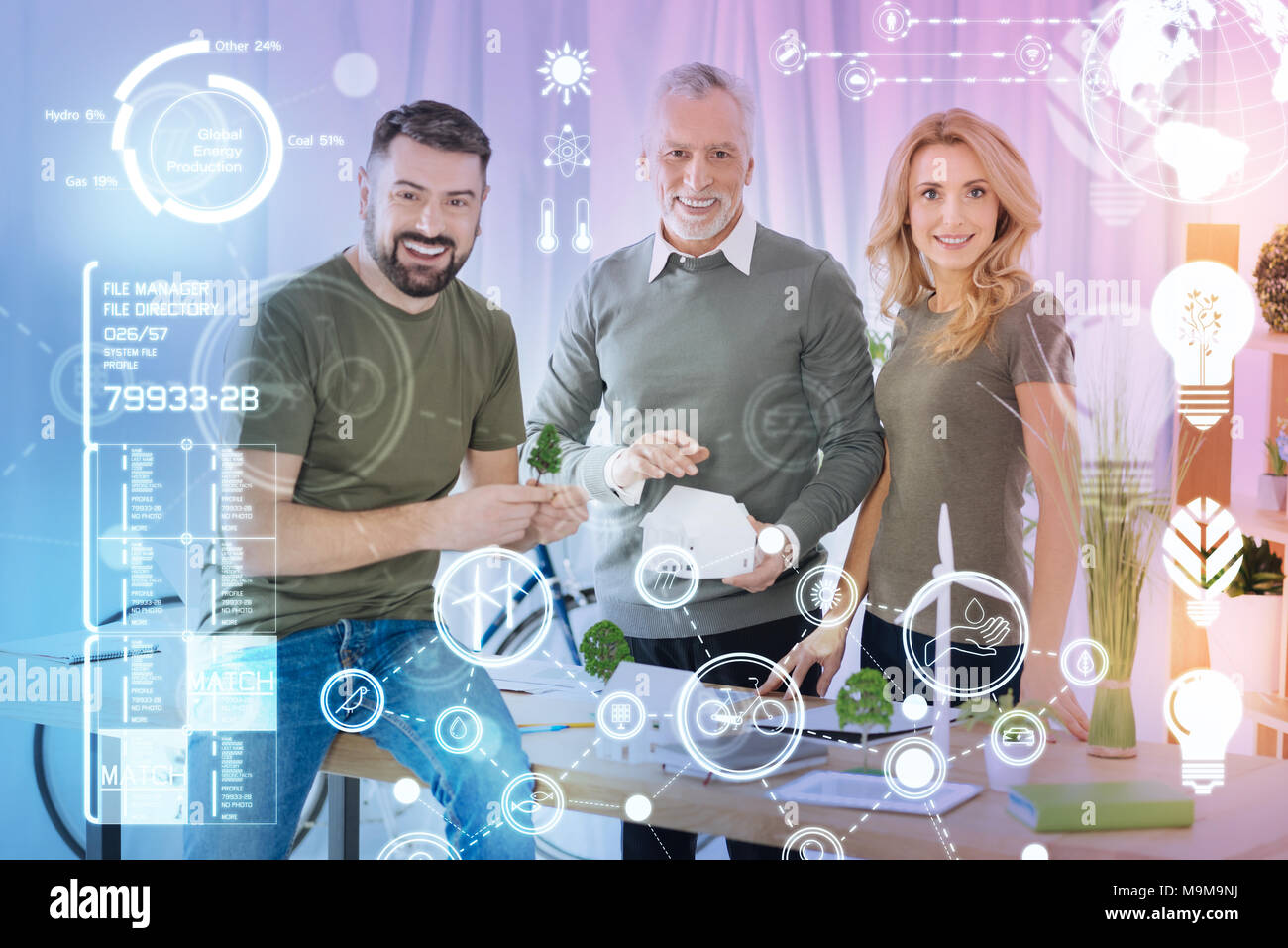 Positive emotional engineers smiling and looking confident Stock Photo ...