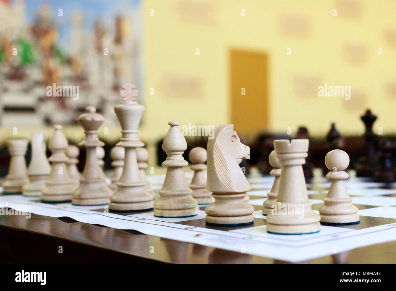 Wooden chess pieces on the table Stock Photo - Alamy