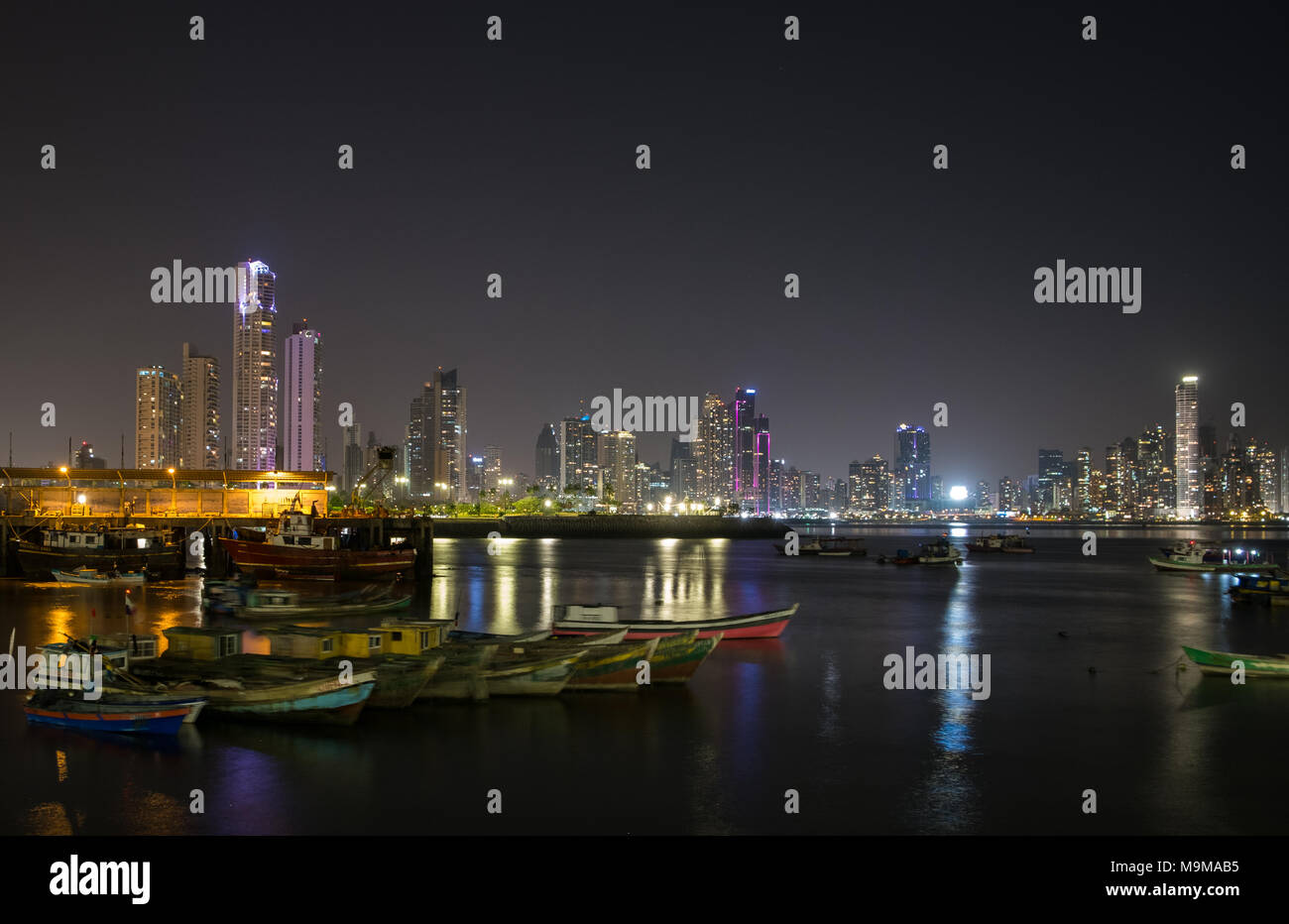 Panama City skyline at night - fish market and boats at night Stock ...