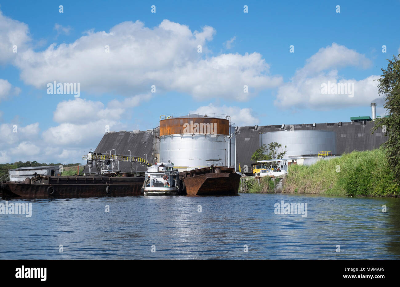 Modern sugar processing plant on the banks of the New River in northern ...