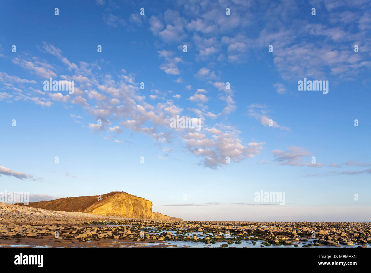 Llantwit Major Beach and Limestone cliffs with a big sky Stock Photo ...