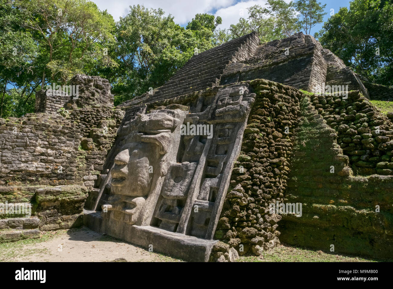 Ancient Mayan ruins and temples in the archeological site of Lamanai ...
