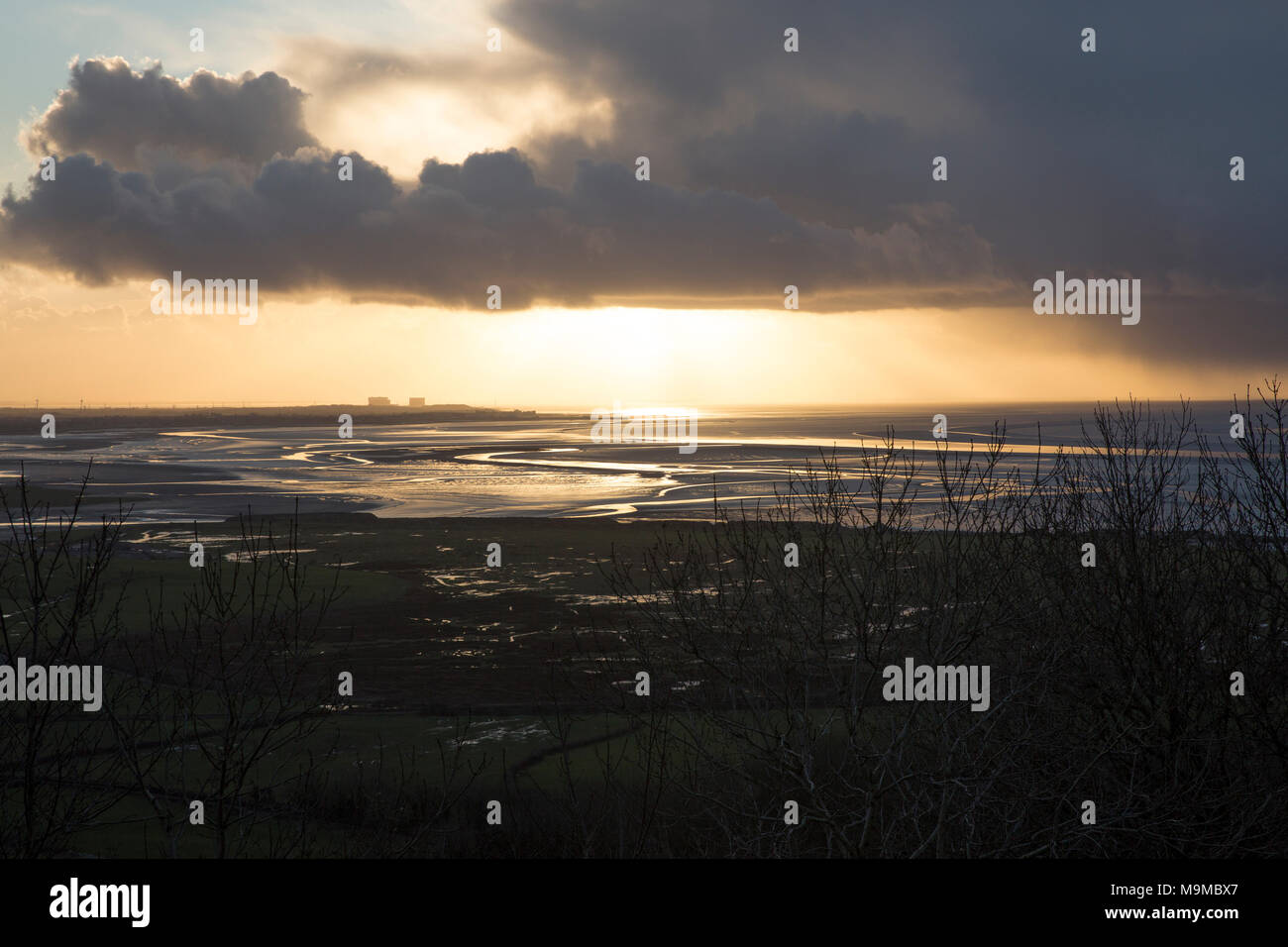 Heysham nuclear power station on the shores of Morecambe Bay with storm ...