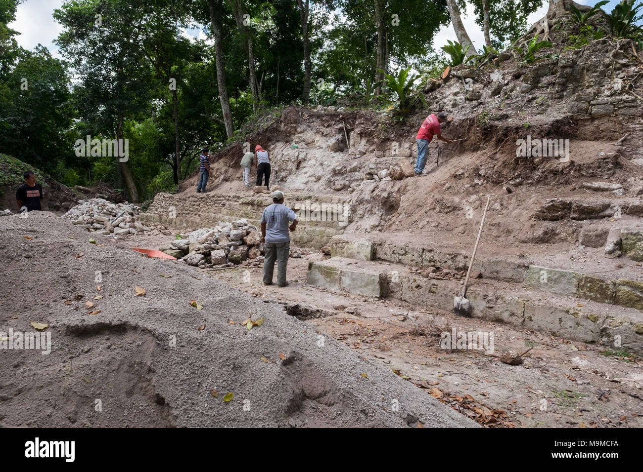 Ongoing excavation work on ancient Mayan ruins and temples of Nakum ...