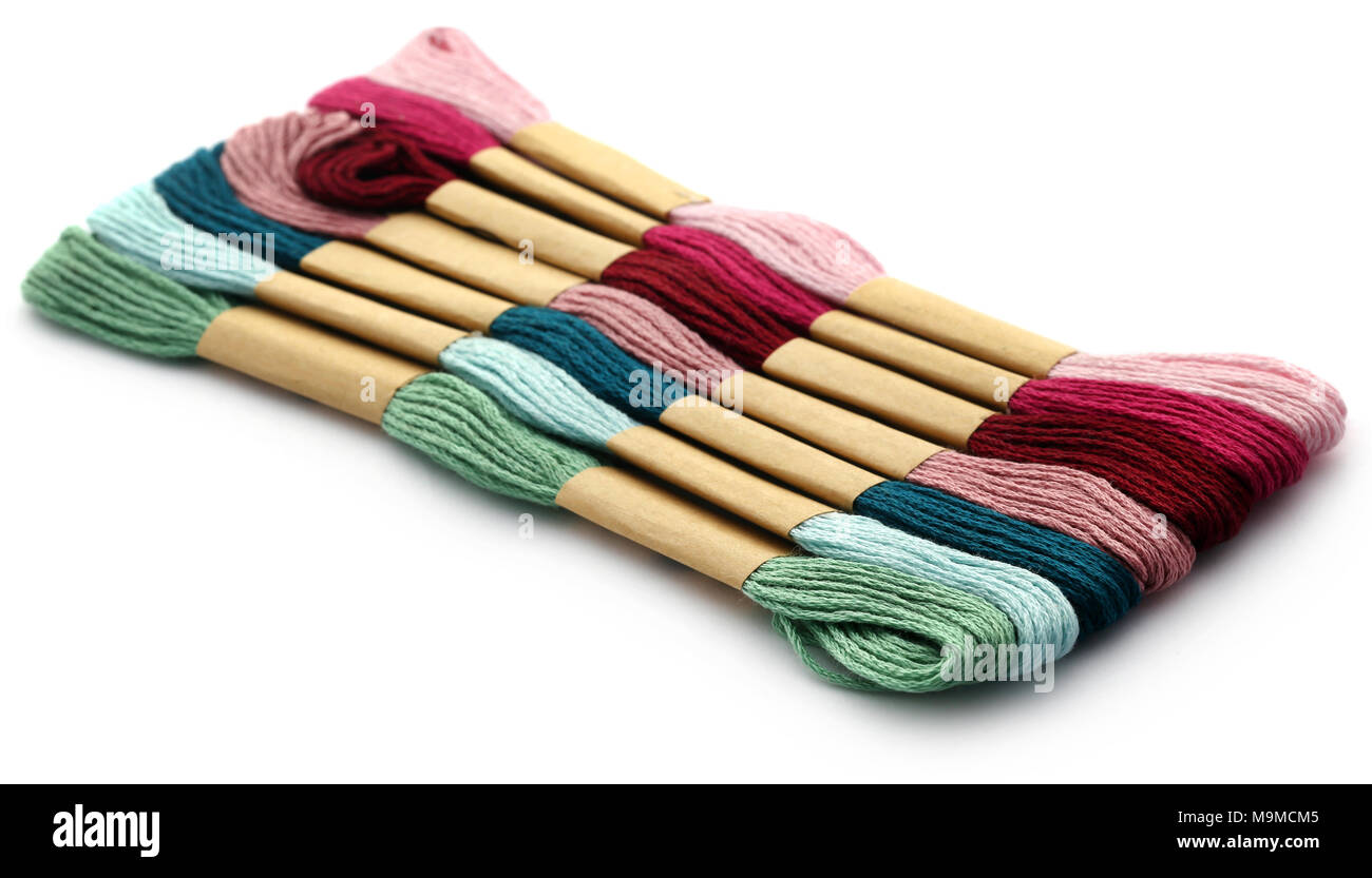 Woolen thread over white background Stock Photo - Alamy