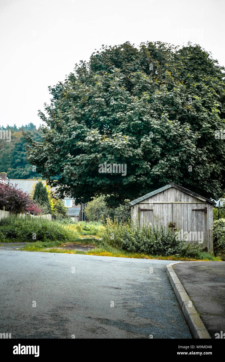 Old garages in a rundown back street Stock Photo - Alamy