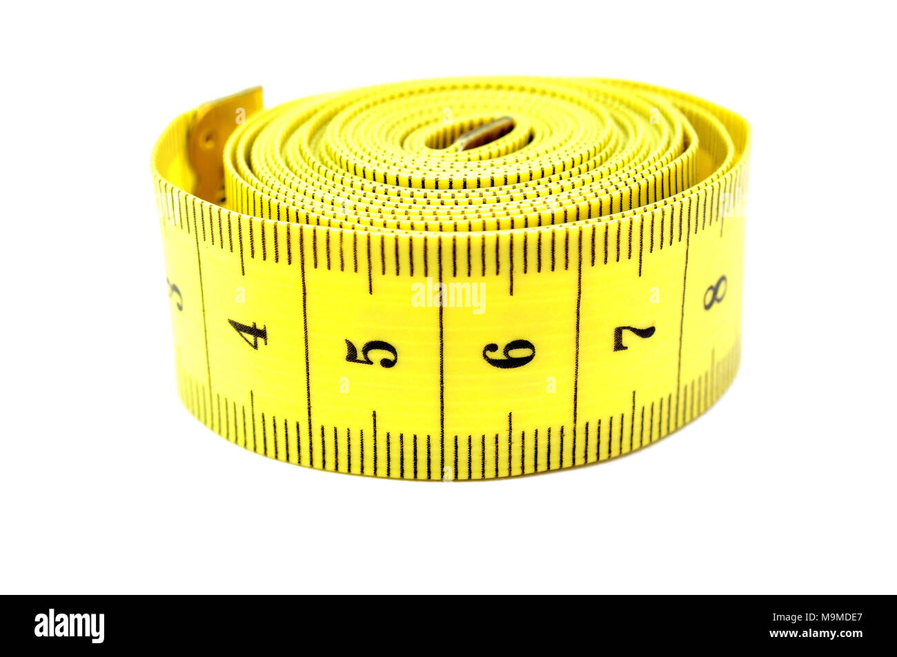 measuring tape on a white background Stock Photo - Alamy