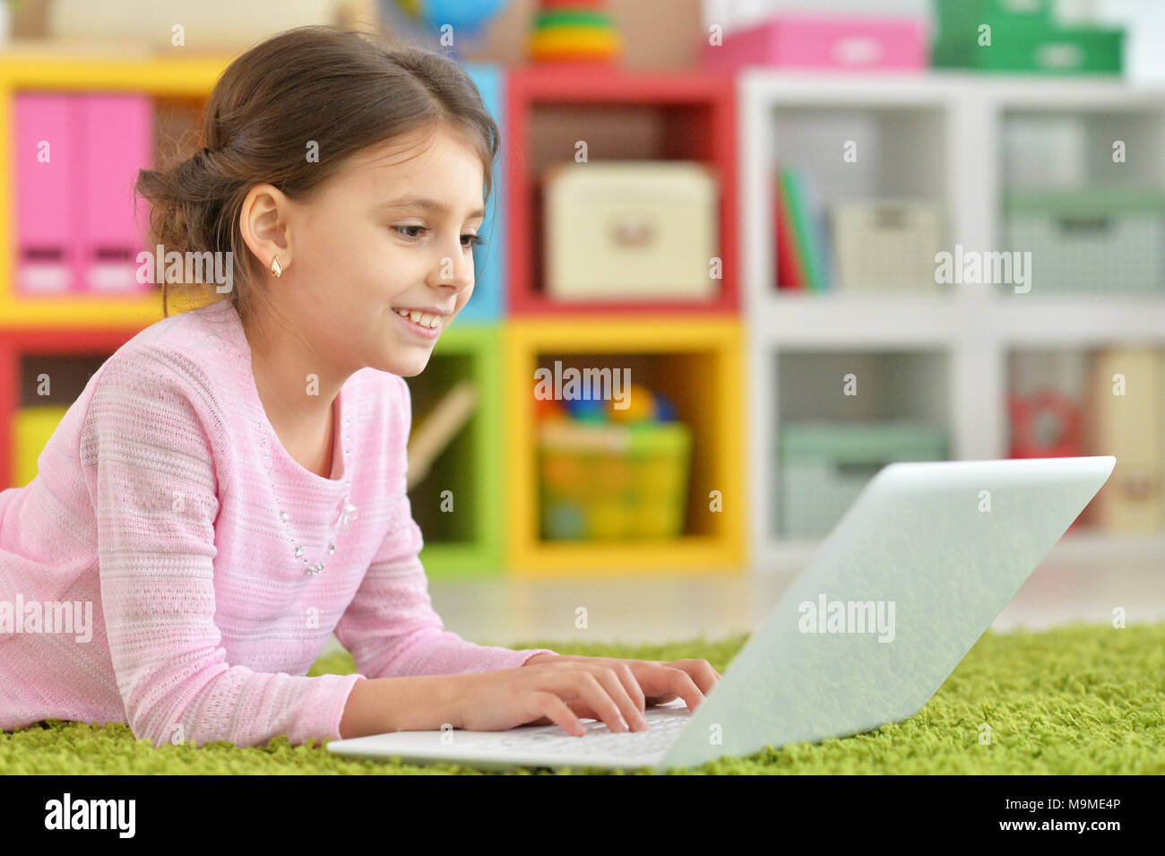 Portrait Of Gute Little Girl Using Modern Laptop Stock Photo Alamy