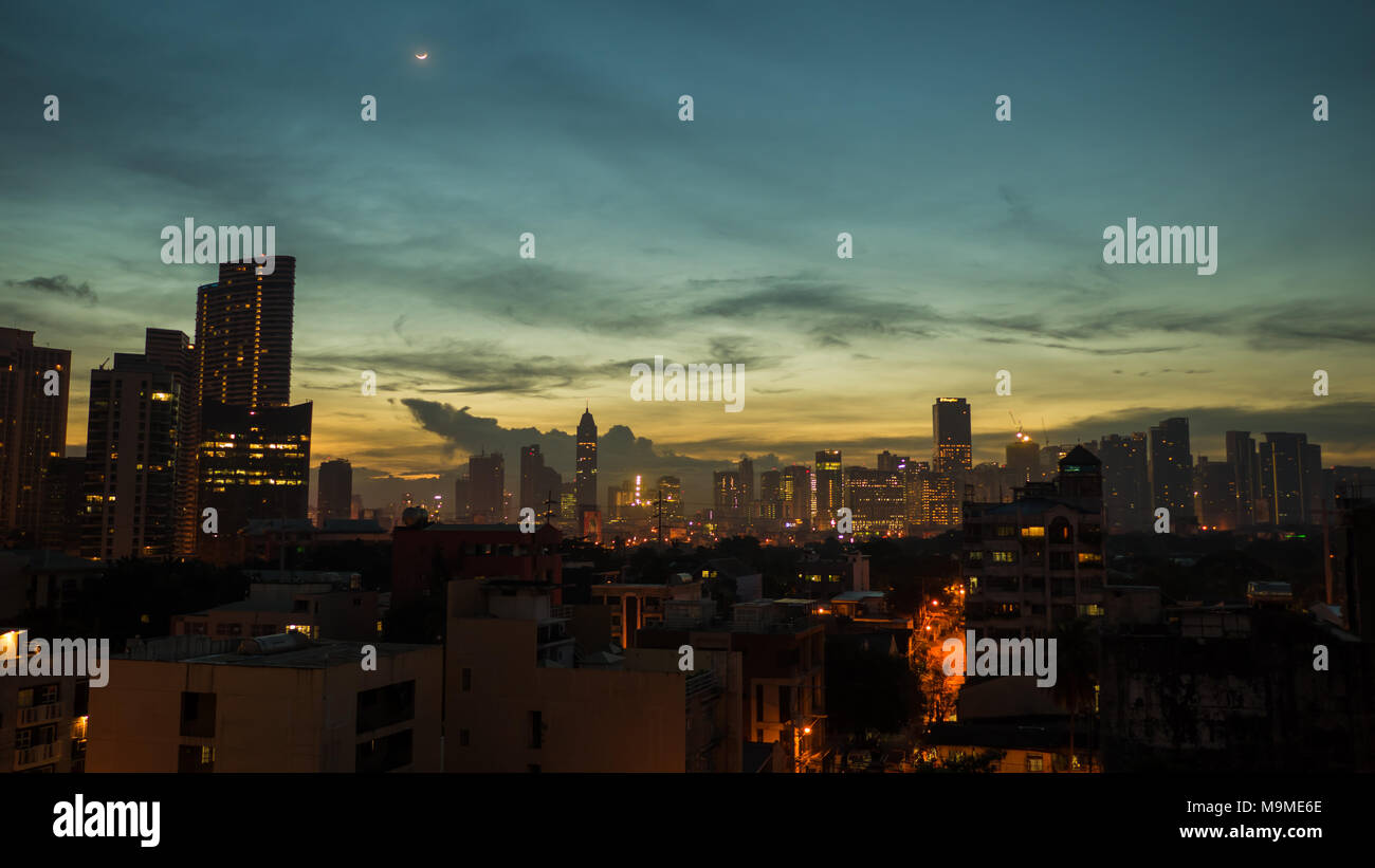 Panorama of the City of Manila with skyscrapers early in the morning ...