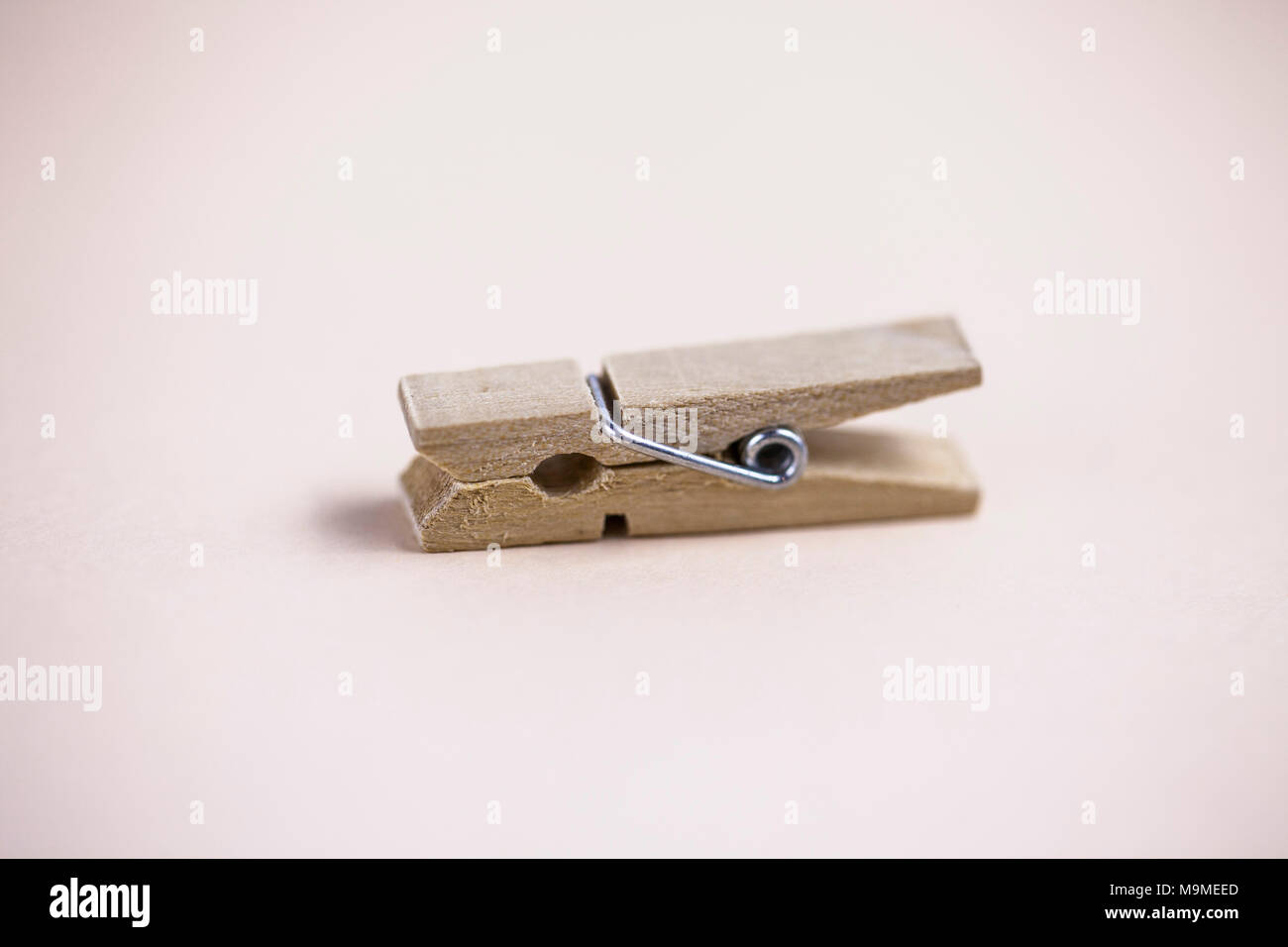 Wooden clothes peg isolated on a white background, close up Stock Photo ...