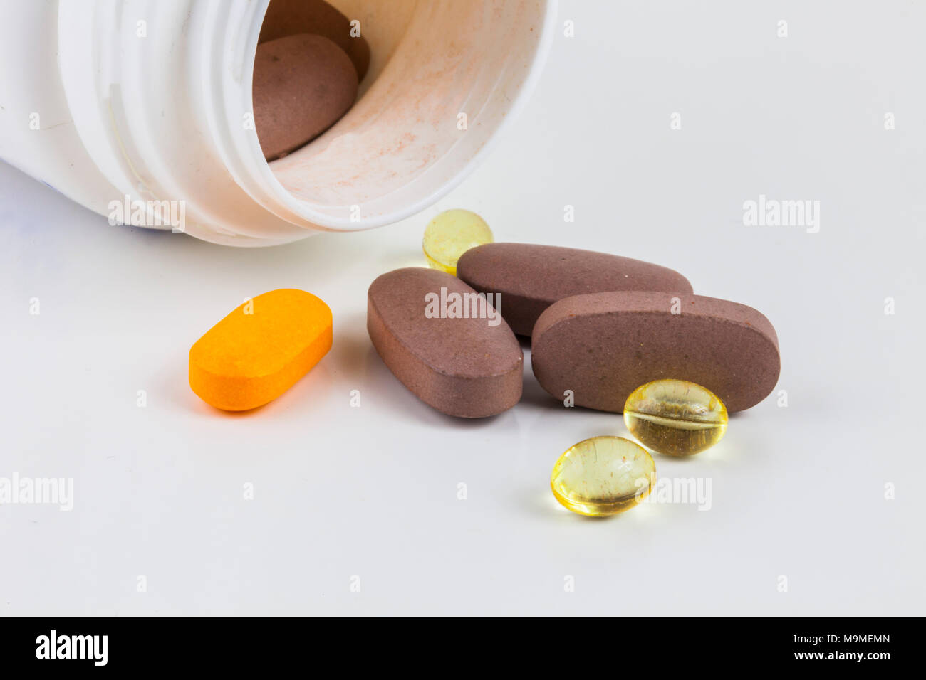 Colorful of oral medications on White Background, close up Stock Photo ...