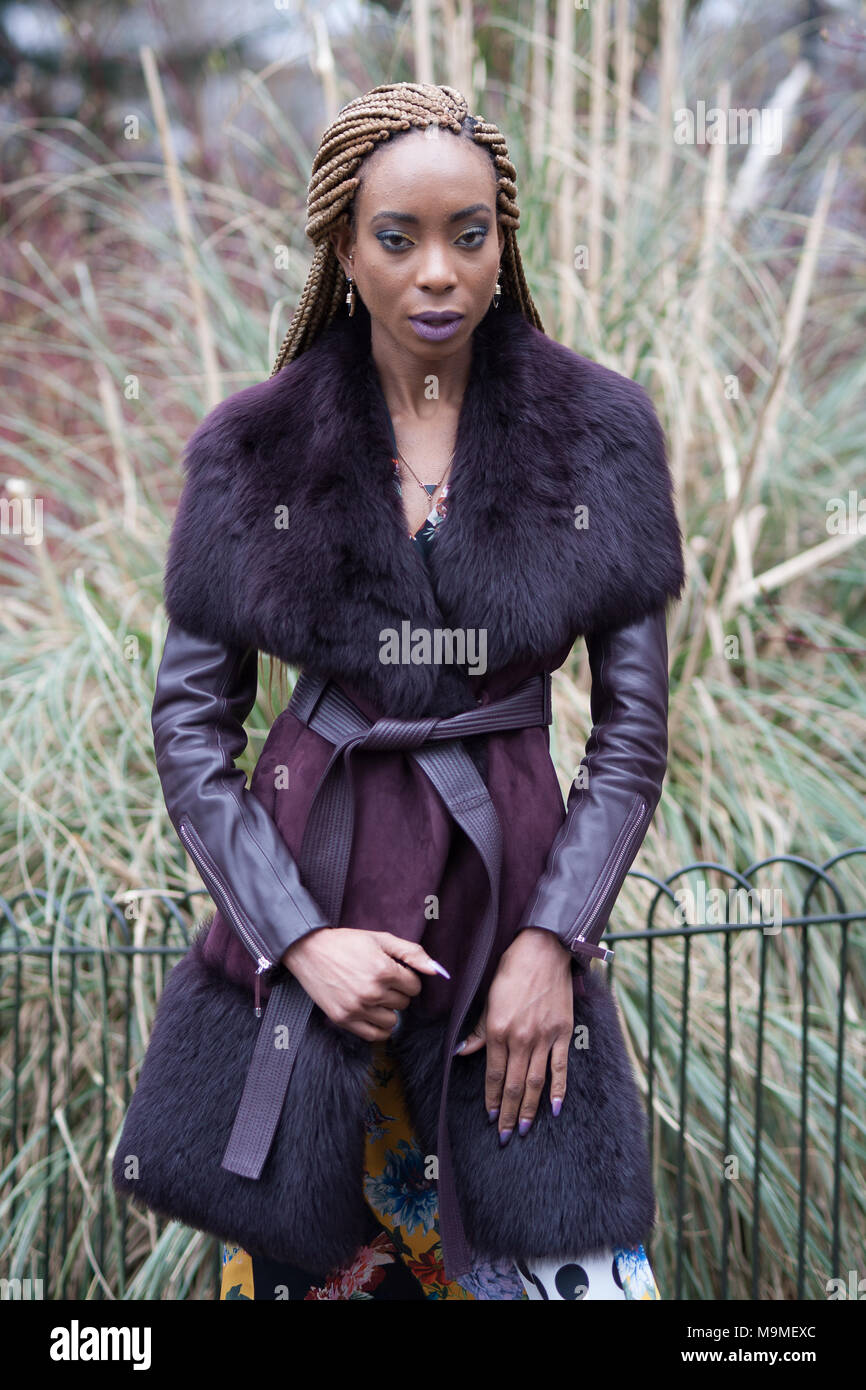 West Indian woman posing clothes Stock Photo - Alamy