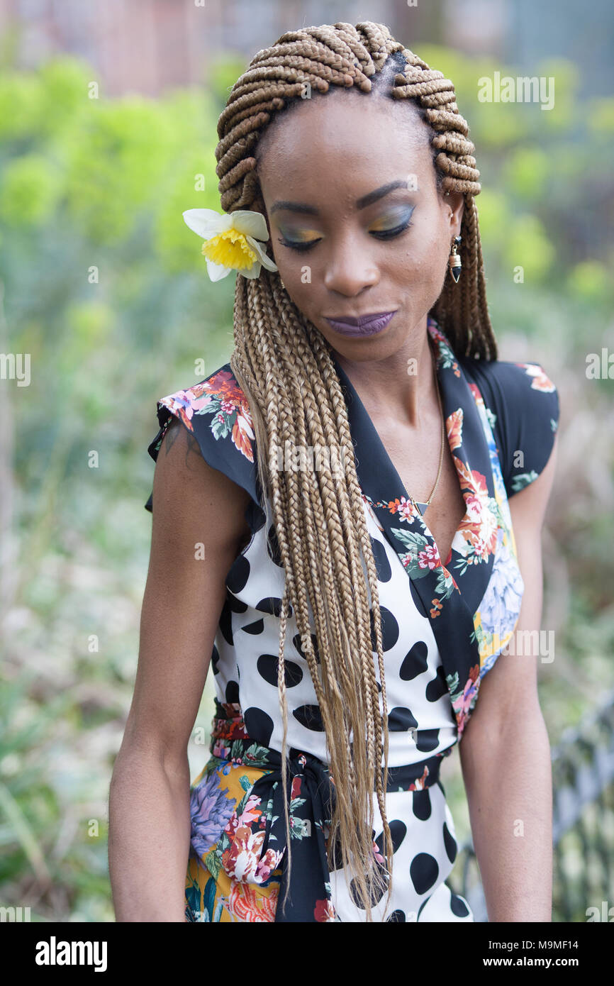 West Indian woman posing clothes Stock Photo - Alamy