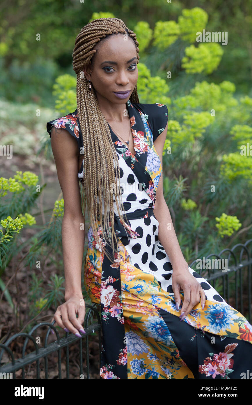 West Indian woman posing clothes Stock Photo - Alamy