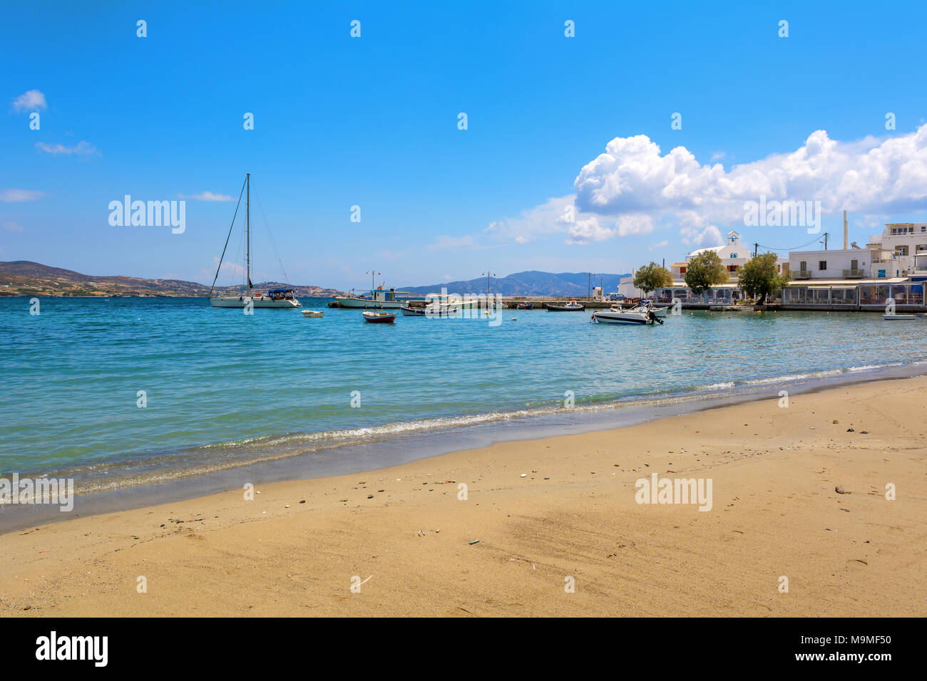 View of bay and coastline in Pollonia village. Milos island, Greece ...